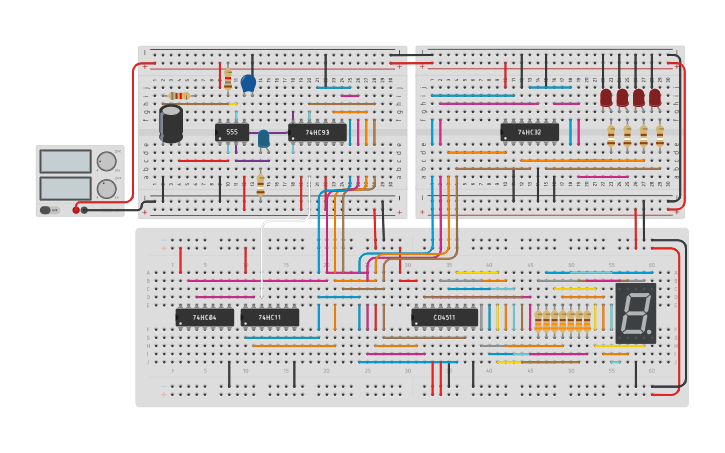 Circuit design Circuito de reloj 555 y sistema 74HC93 a 0-9 | Tinkercad
